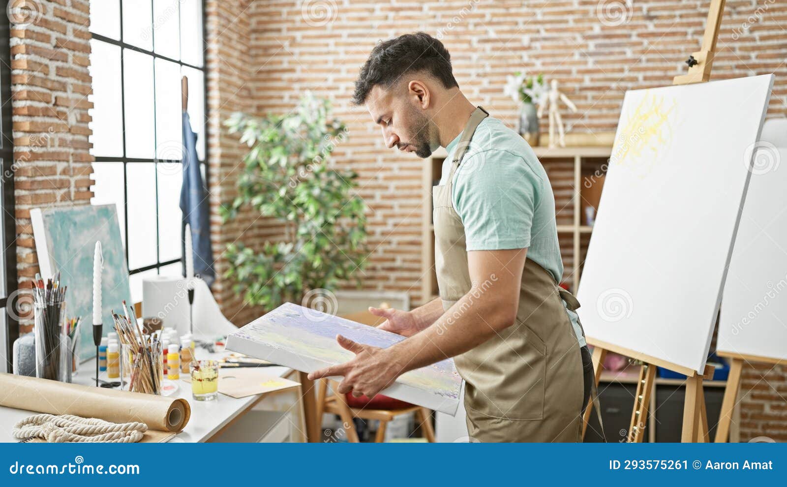 Young Arab Man Artist Looking Draw at Art Studio Stock Image - Image of ...