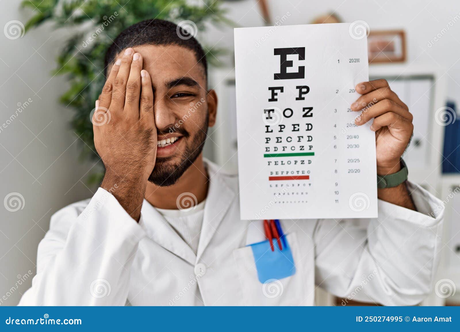 Young Arab Man Holding Sneller Test at Clinic Stock Image - Image of ...