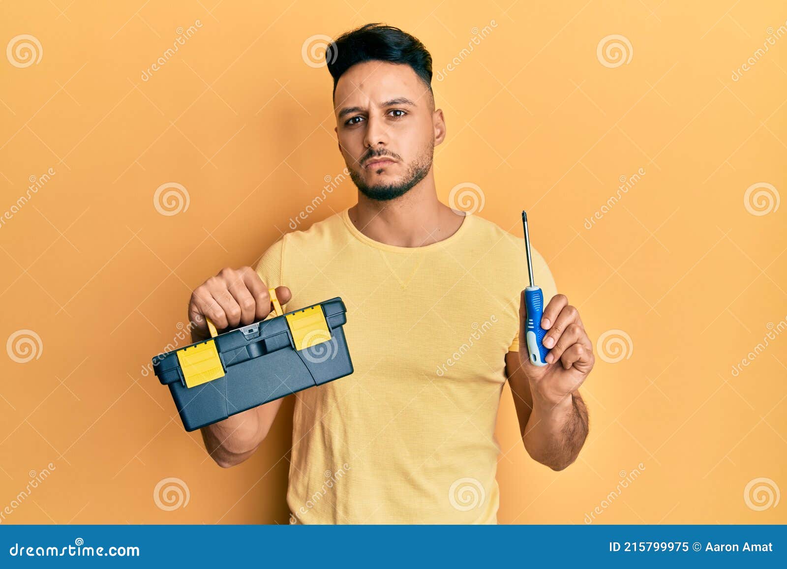 Young Arab Man Holding Toolbox and Screwdriver Depressed and Worry for ...