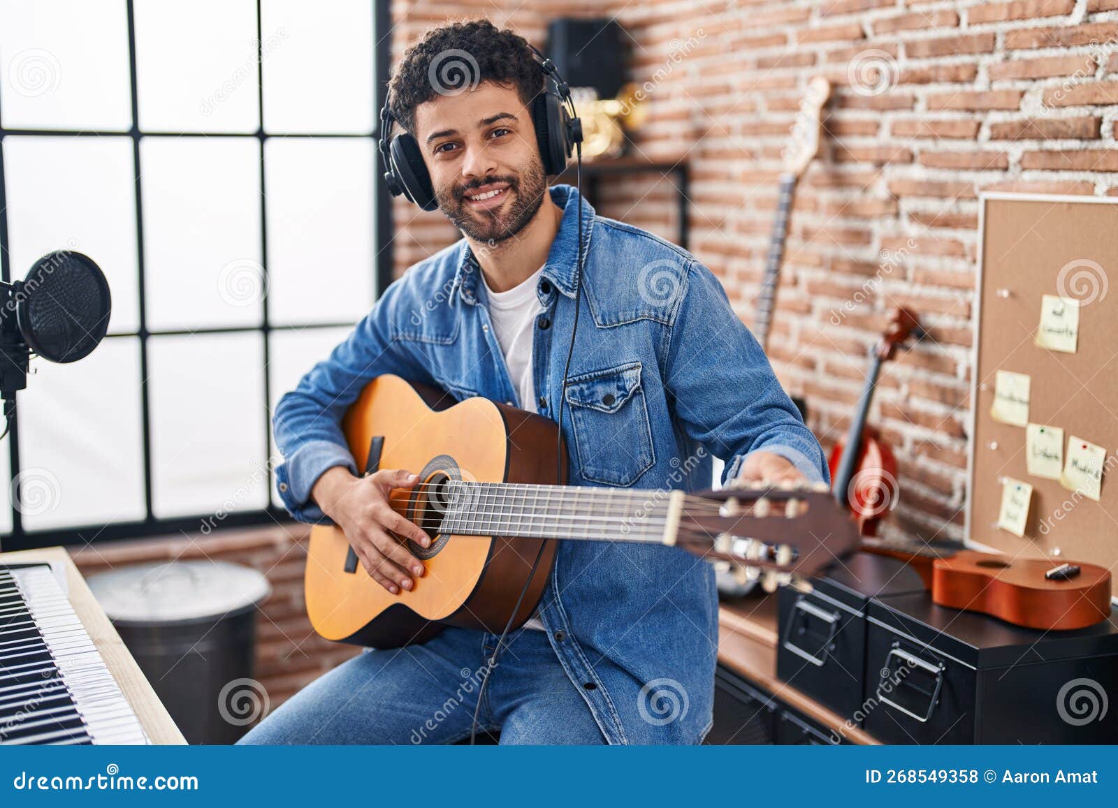 Young Arab Man Musician Playing Classical Guitar at Music Studio Stock ...