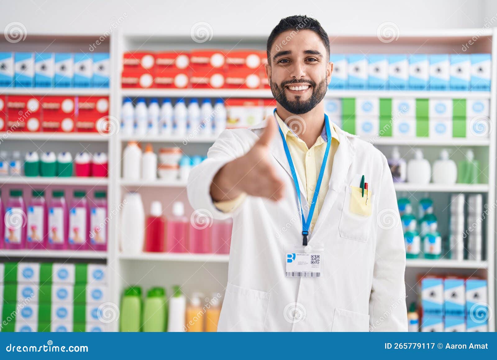 Young Arab Man Pharmacist Smiling Confident Shake Hand at Pharmacy ...