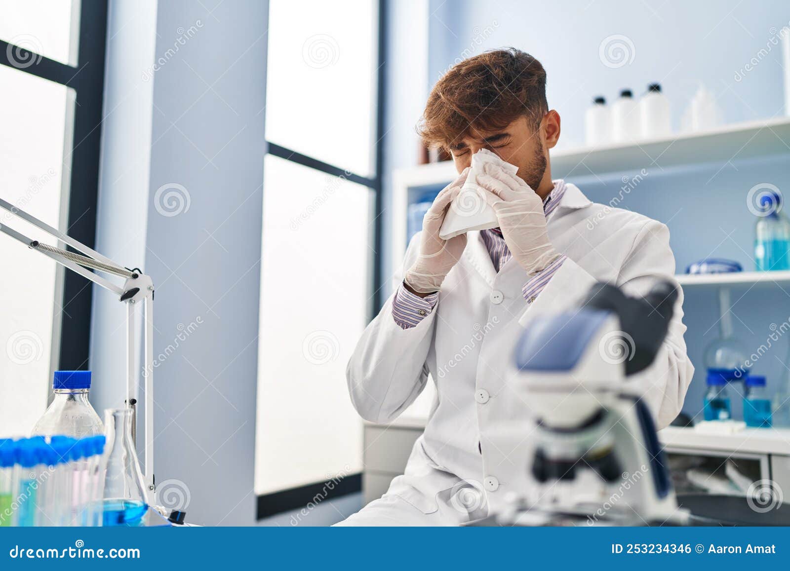 Young Arab Man Scientist Using Napkin at Laboratory Stock Photo - Image ...