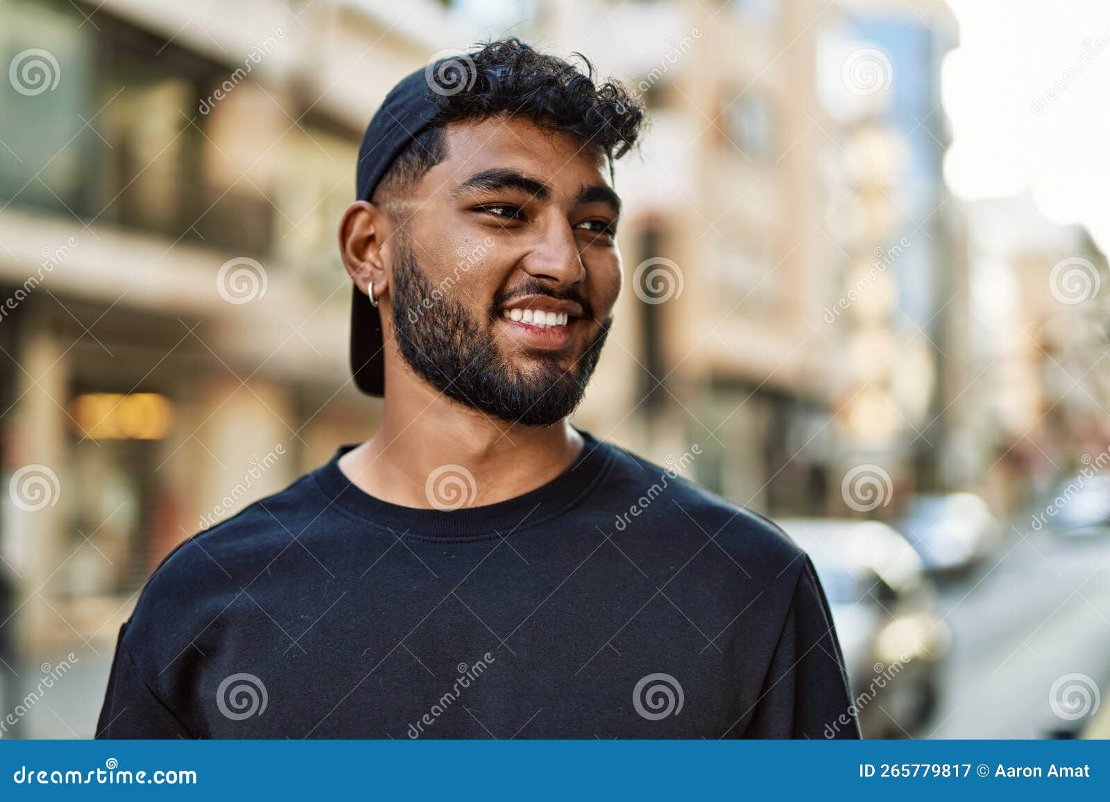 Young Arab Man Smiling Confident Wearing Cap at Street Stock Image ...
