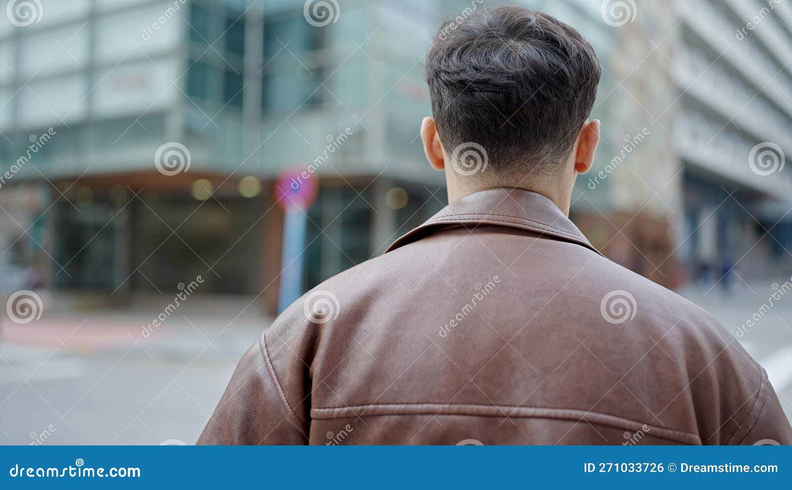 Young Arab Man Standing Backwards at Street Stock Photo - Image of ...