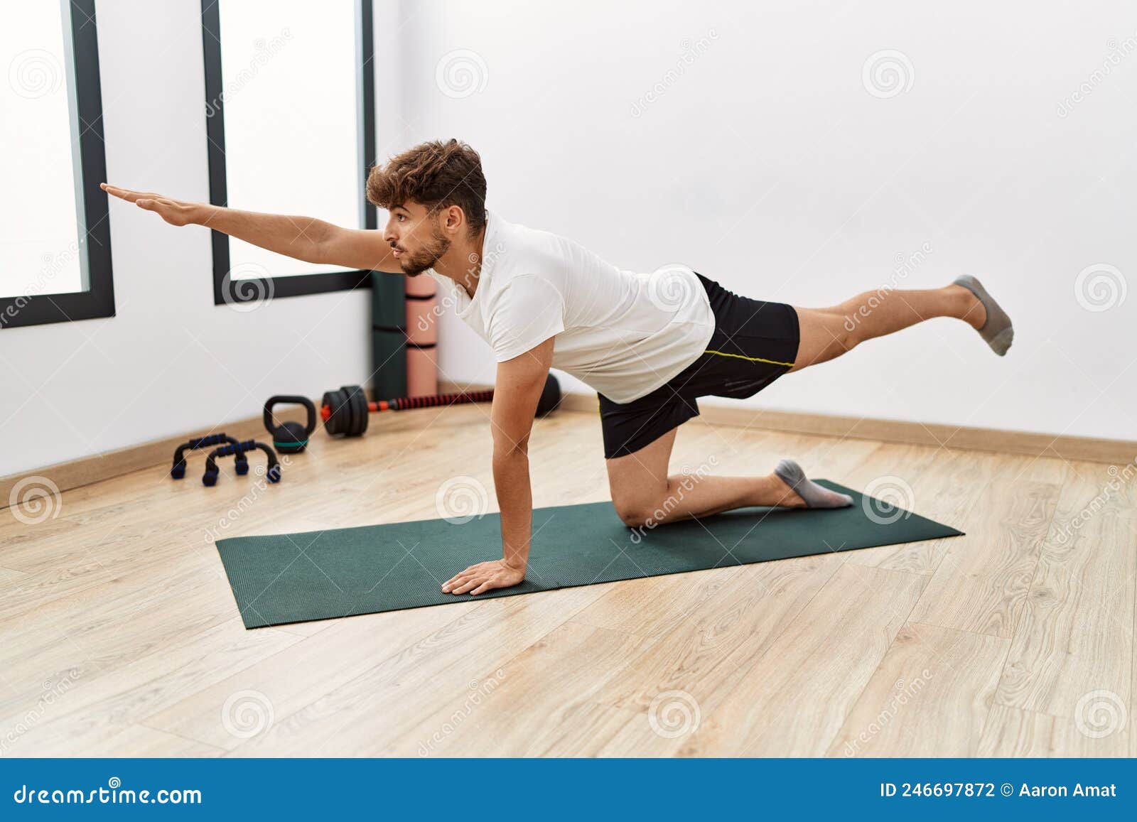 Young Arab Man Stretching at Sport Center Stock Photo - Image of ...