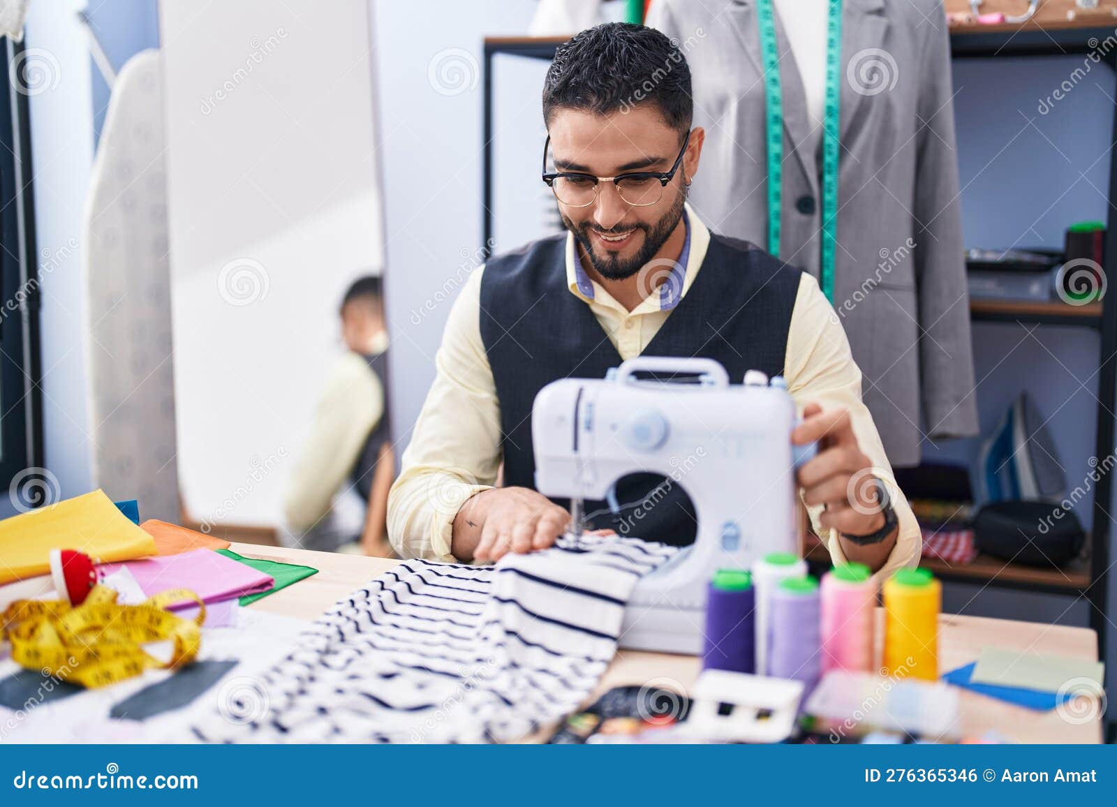 Young Arab Man Tailor Smiling Confident Using Sewing Machine at ...