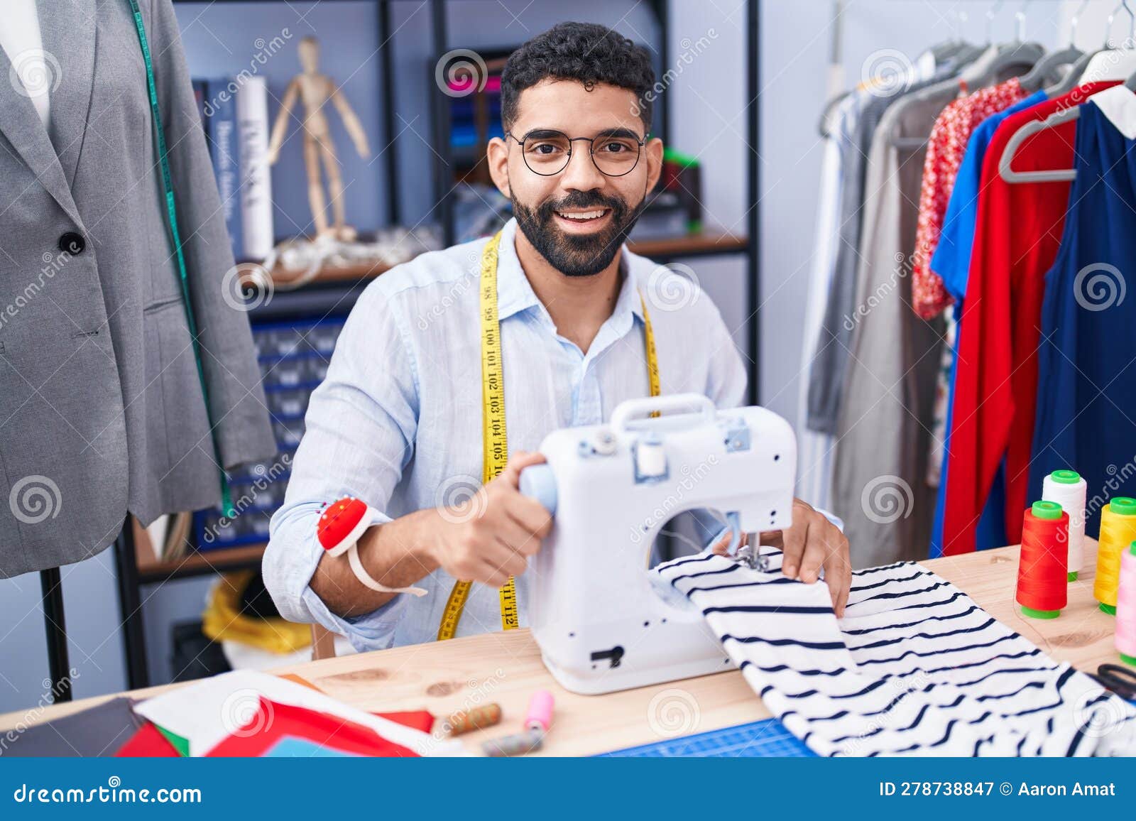 Young Arab Man Tailor Smiling Confident Using Sewing Machine at Tailor ...