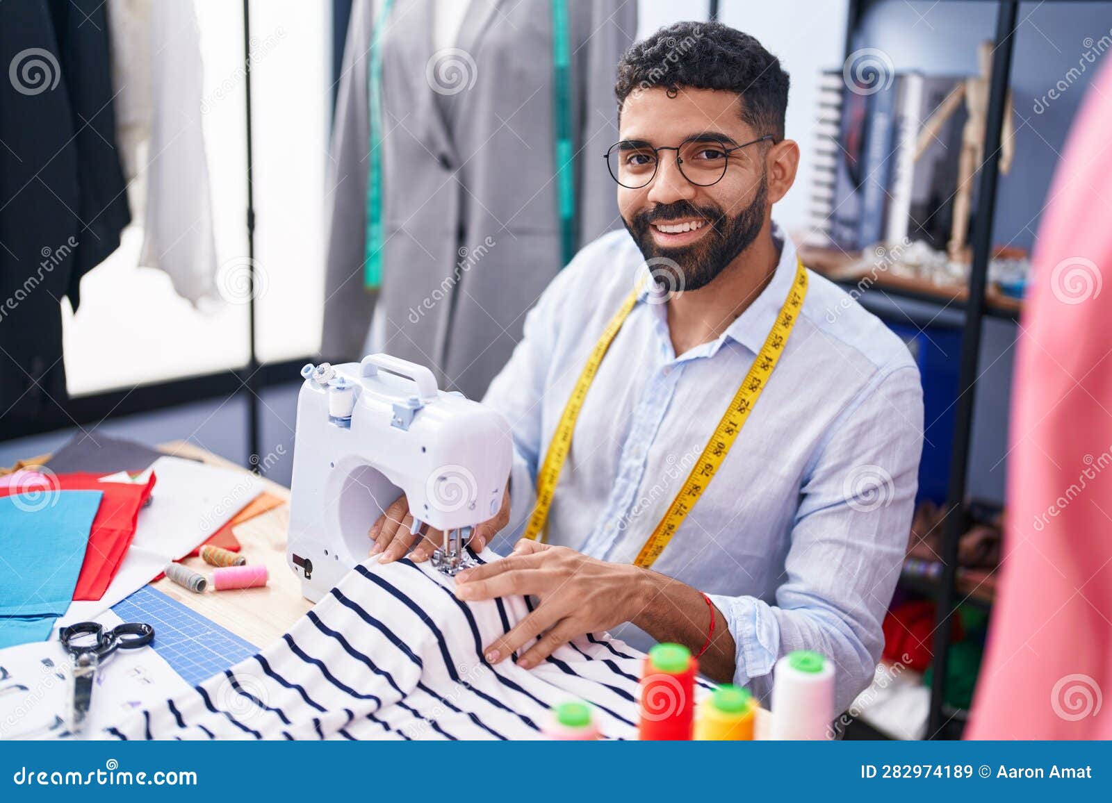 Young Arab Man Tailor Smiling Confident Using Sewing Machine at Tailor ...