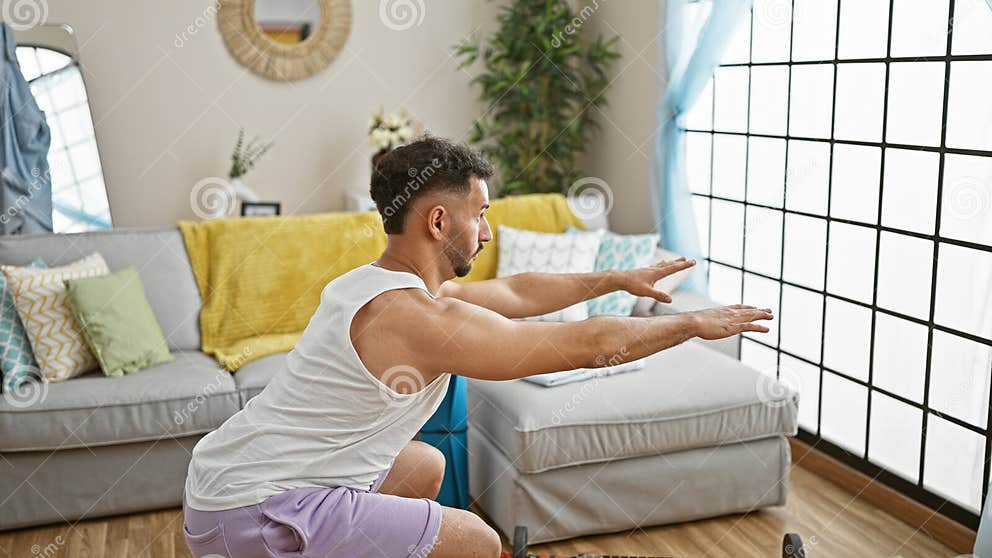 Young Arab Man Training Legs Exercise at Home Stock Image - Image of ...