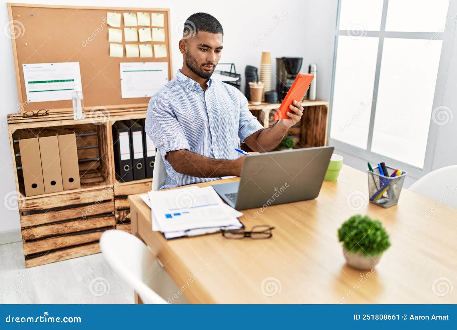 Young Arab Man Using Touchpad and Laptop Working at Office Stock Image ...
