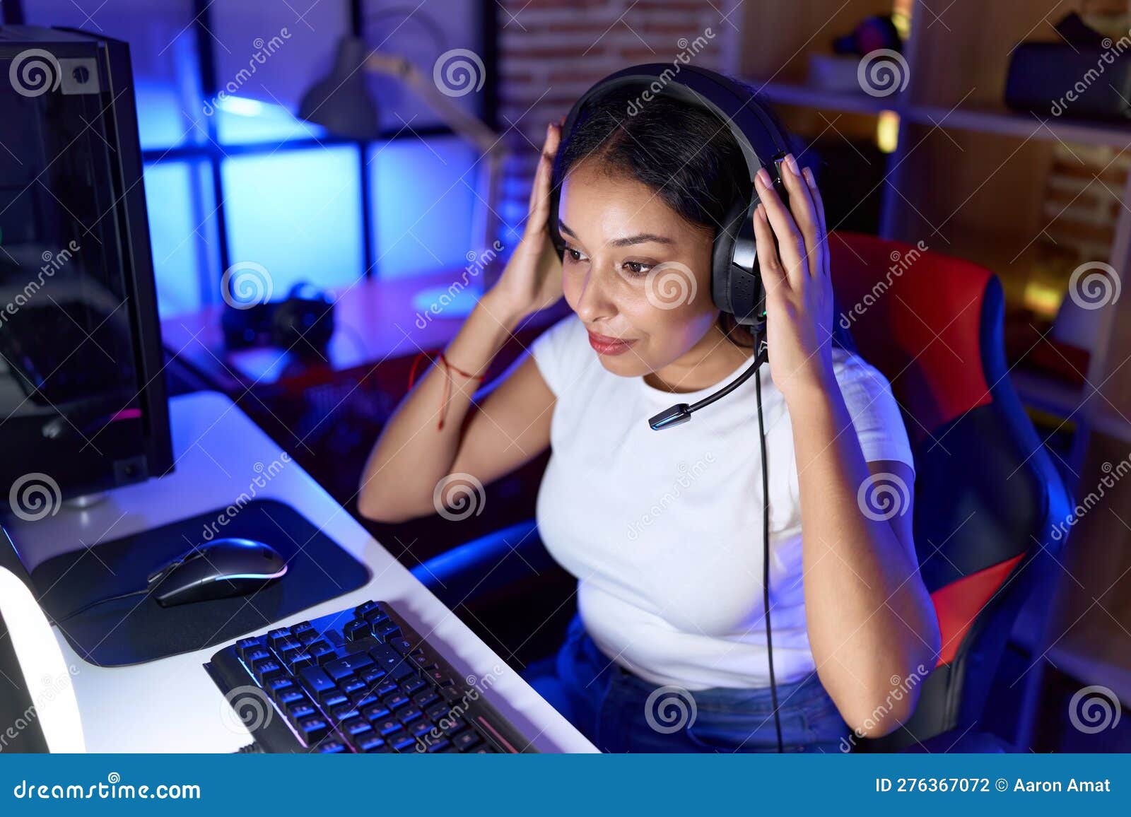Young Arab Woman Streamer Sitting Table with Serious Expression at ...