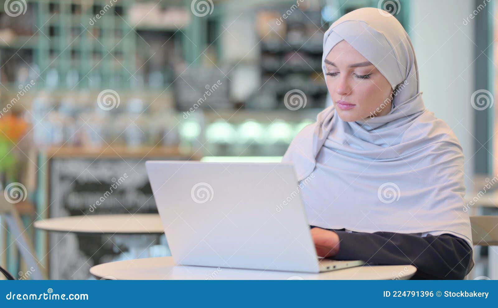 Young Arab Woman Working on Laptop Stock Photo - Image of arab ...