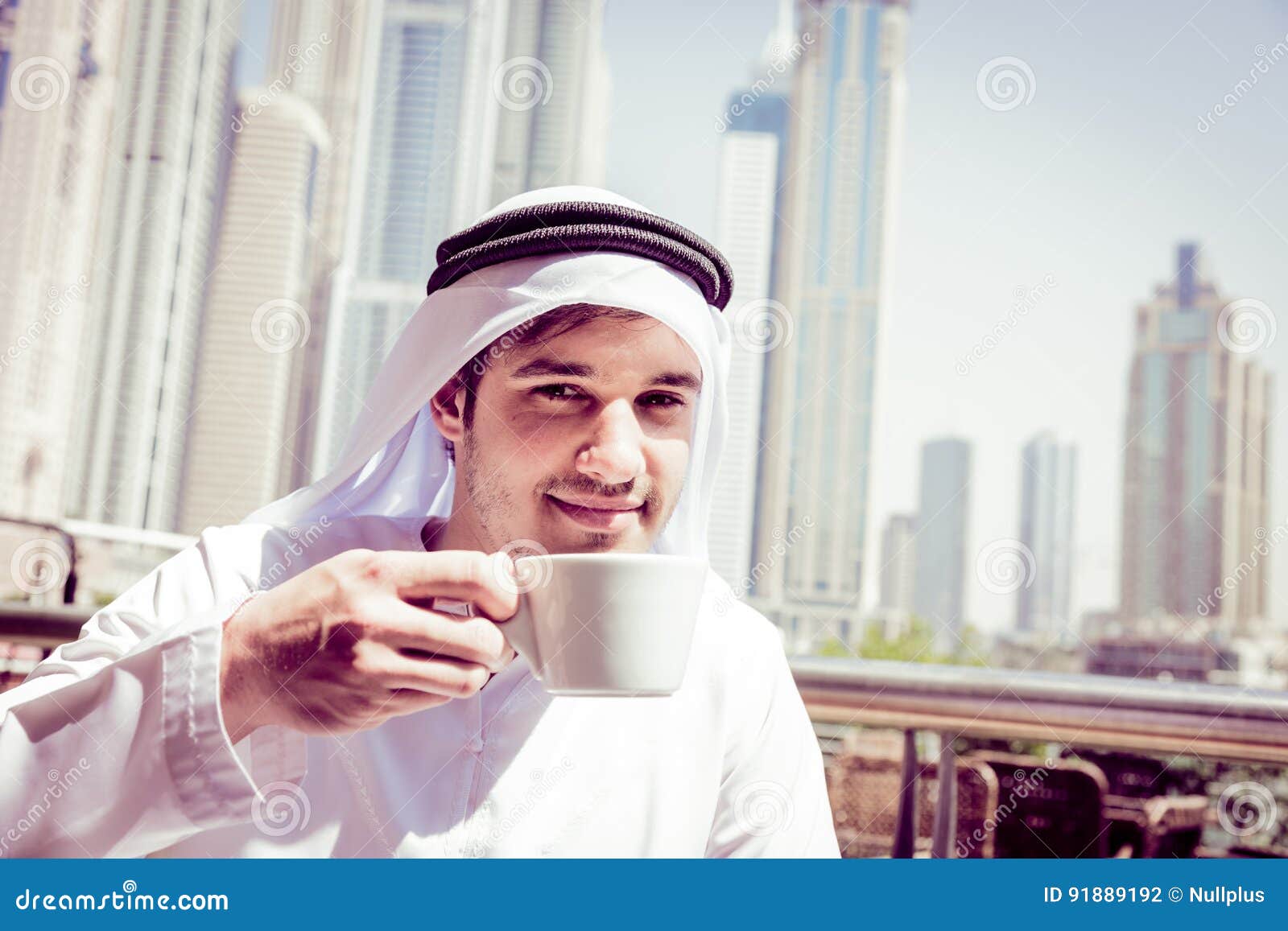 Young Arabian Man Having Coffee Stock Photo - Image of dishdasha ...