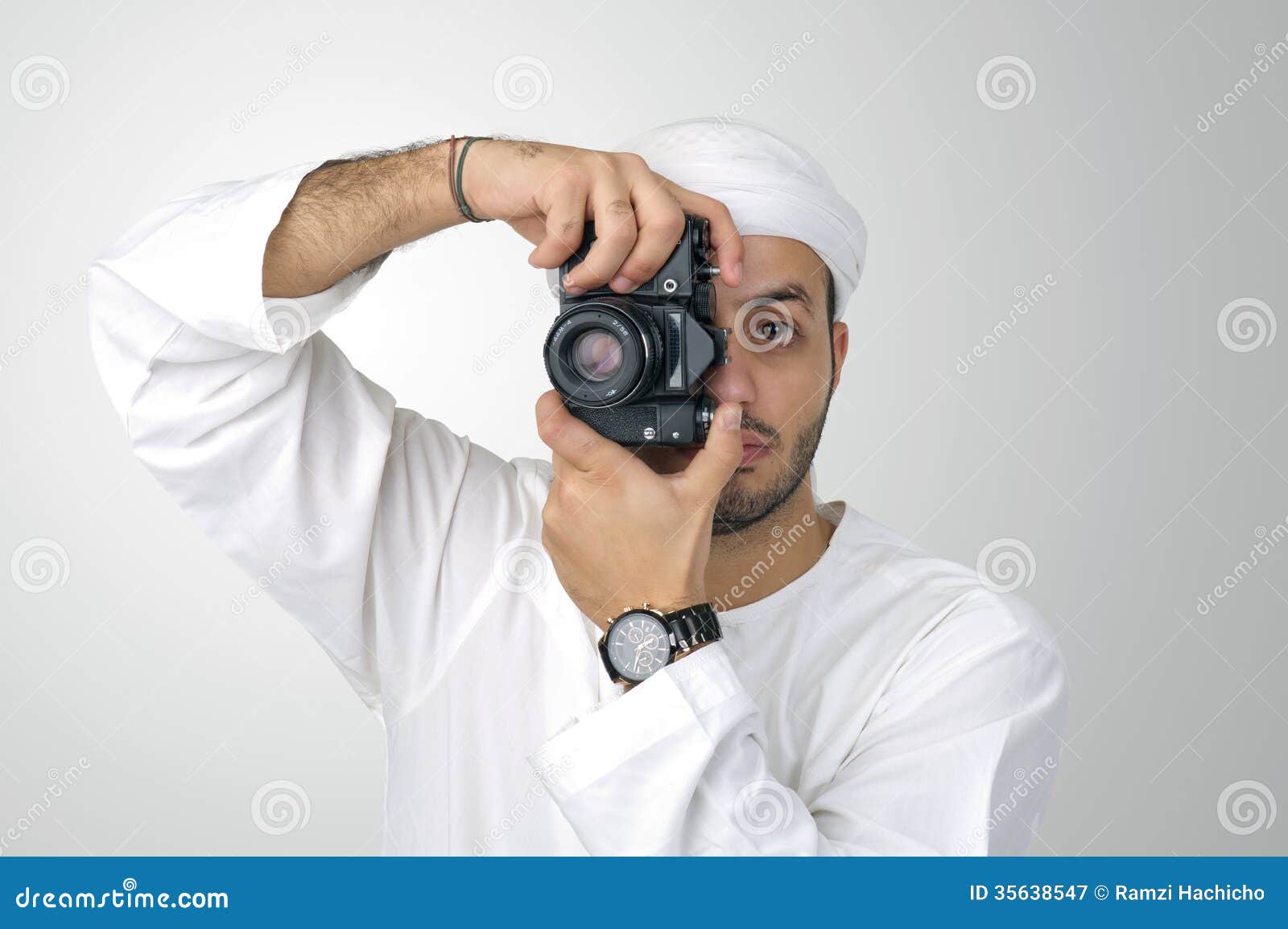 Young Arabian Man Using Holding His Camera Ready To Shoot, Isolated ...