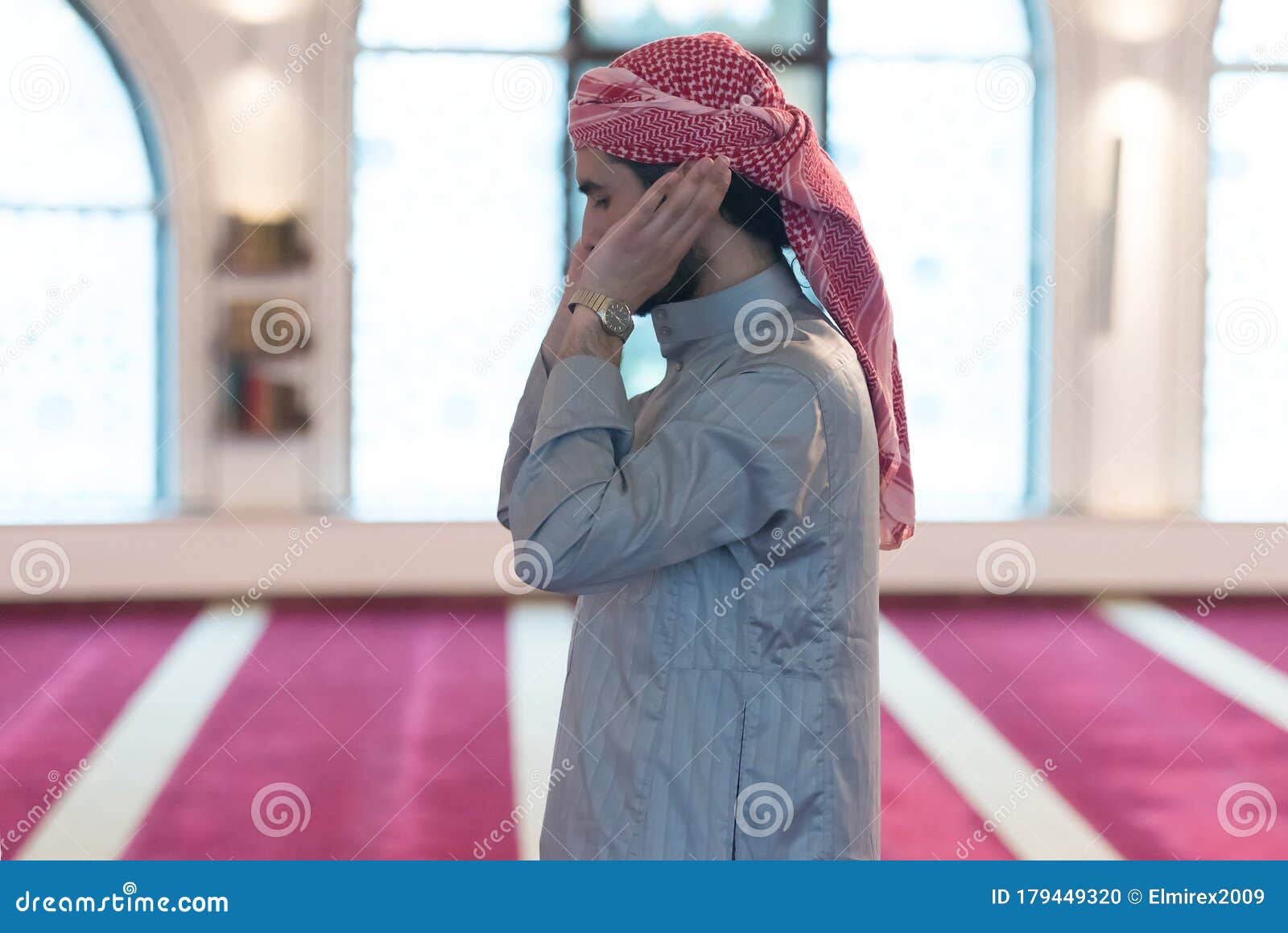 Young Arabic Muslim Man Praying. Doing a Dailly Pray Inside Modern ...