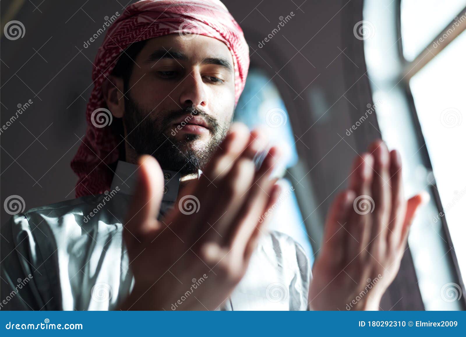 Young Arabic Muslim Man Praying. Doing a Dailly Pray Inside Modern ...