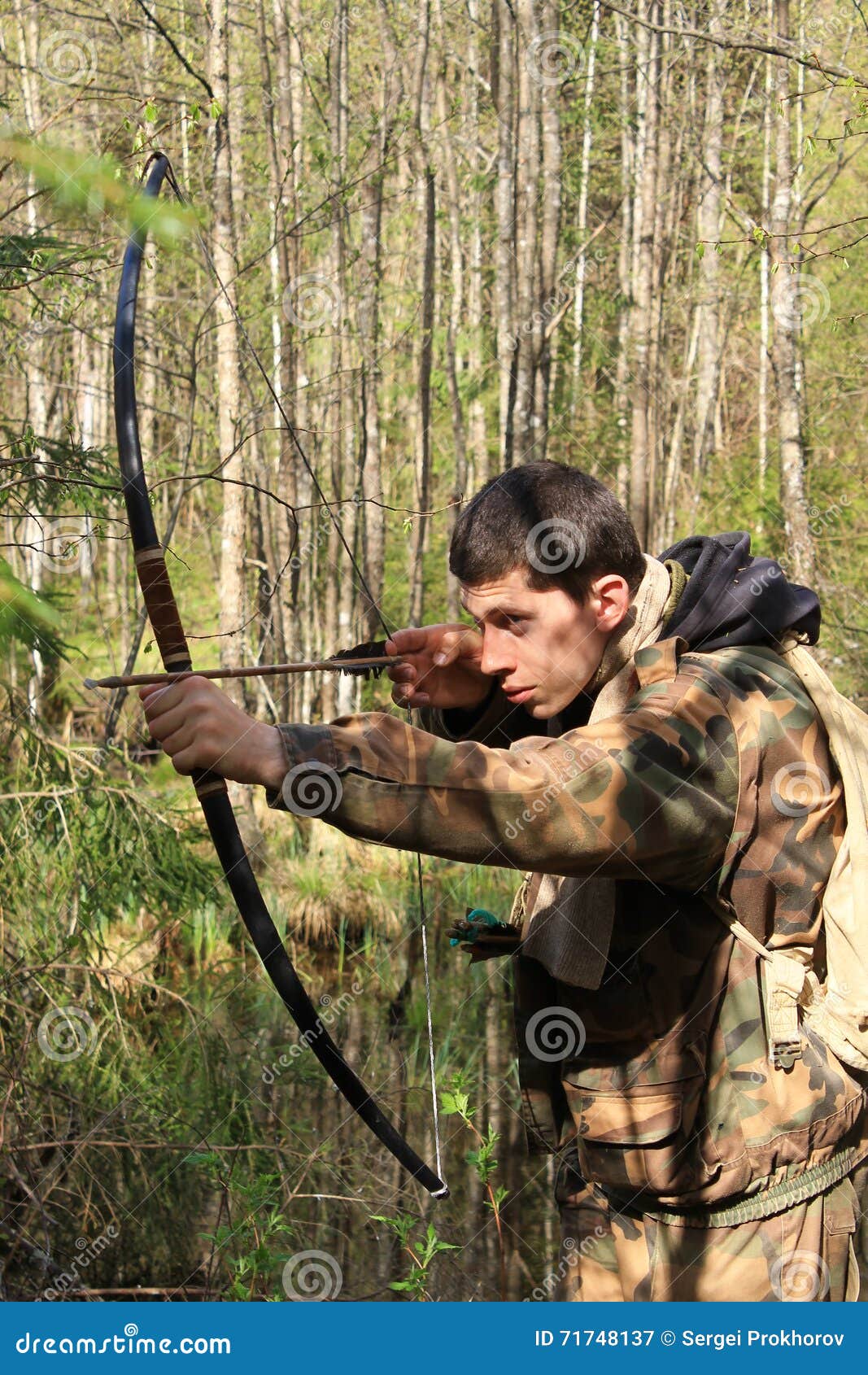 Young archer in forest stock image. Image of extreme - 71748137