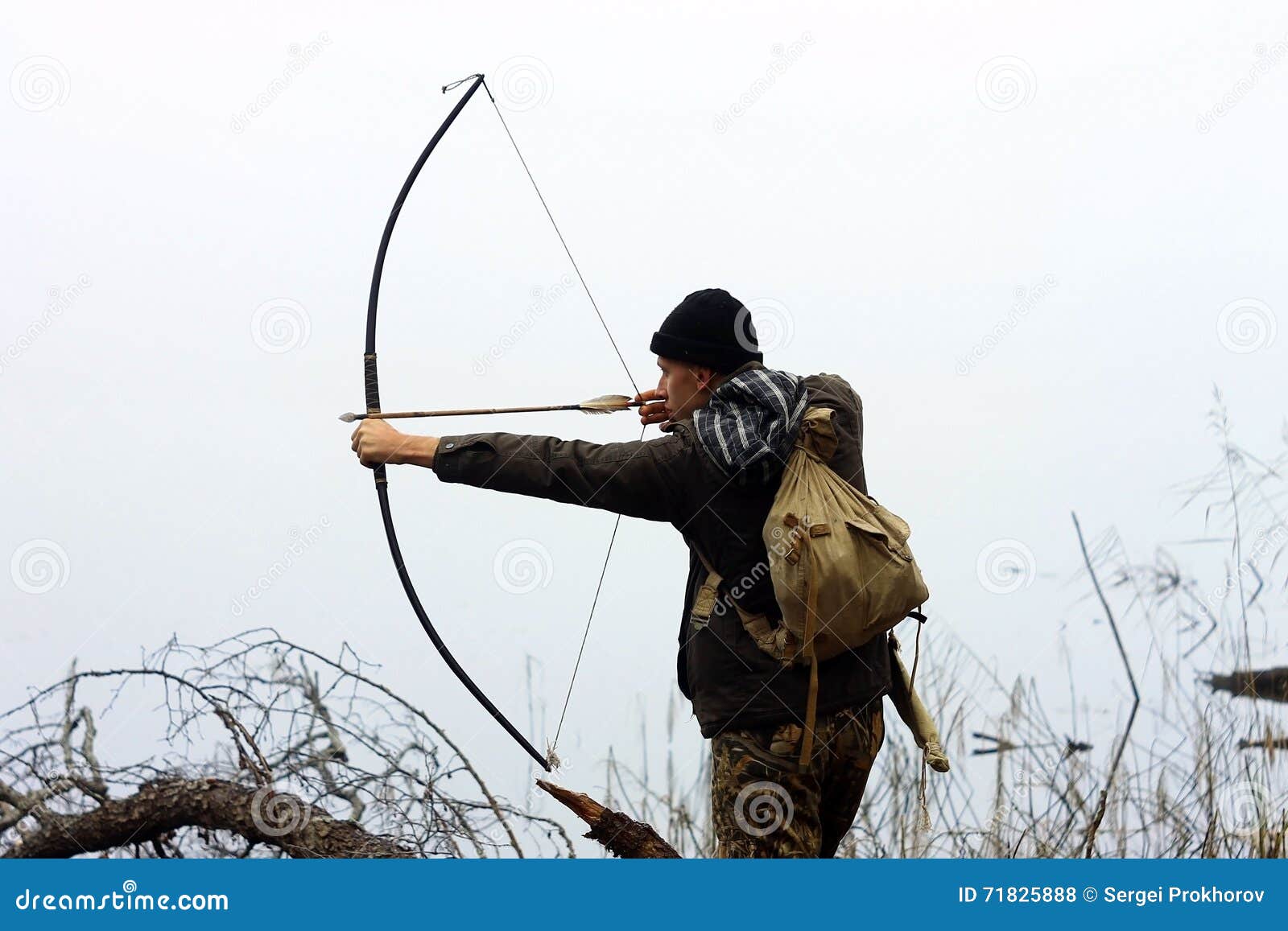 Young archer in forest stock photo. Image of extreme - 71825888