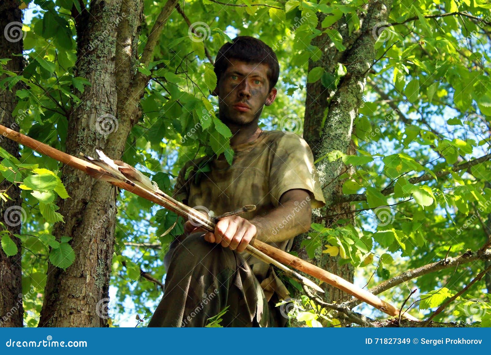 Young archer in forest stock image. Image of forester - 71827349
