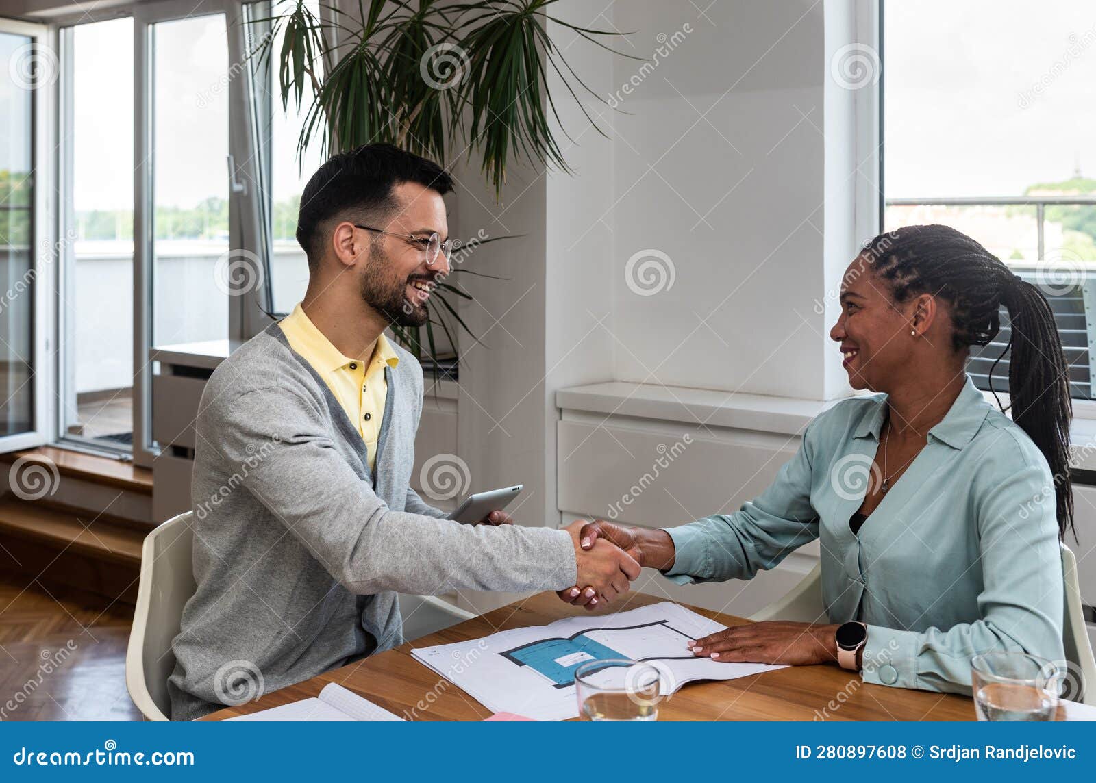 Young Architect Consulting Project with Client. Interior Designer ...