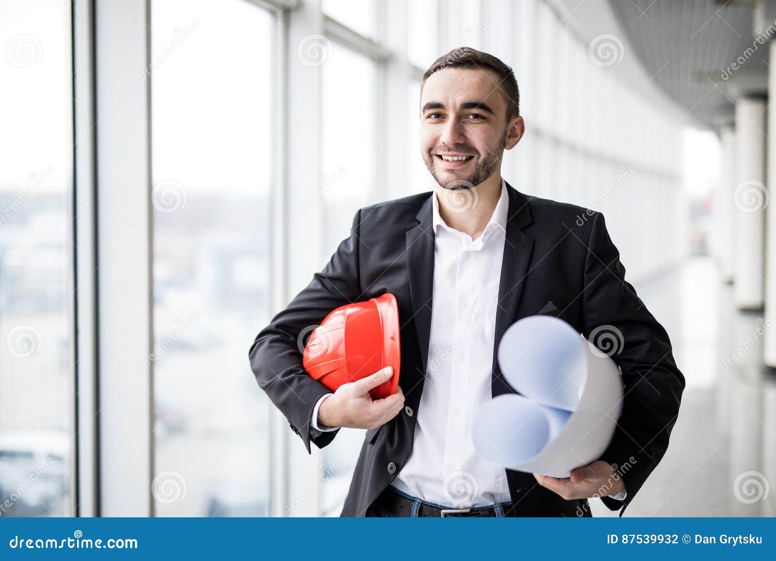 Young Architect Holding Print and Hamlet in Office , Engineering and ...
