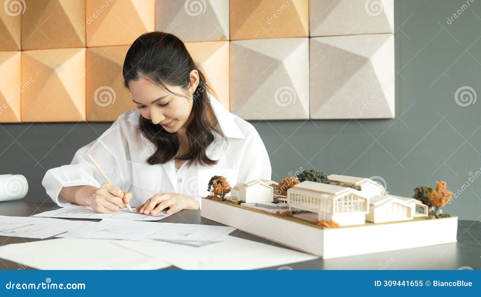 Young Architect Measure House Model while Taking a Note Blueprint ...