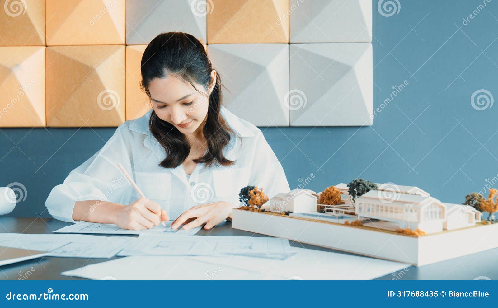 Young Architect Measure House Model while Taking a Note Blueprint ...