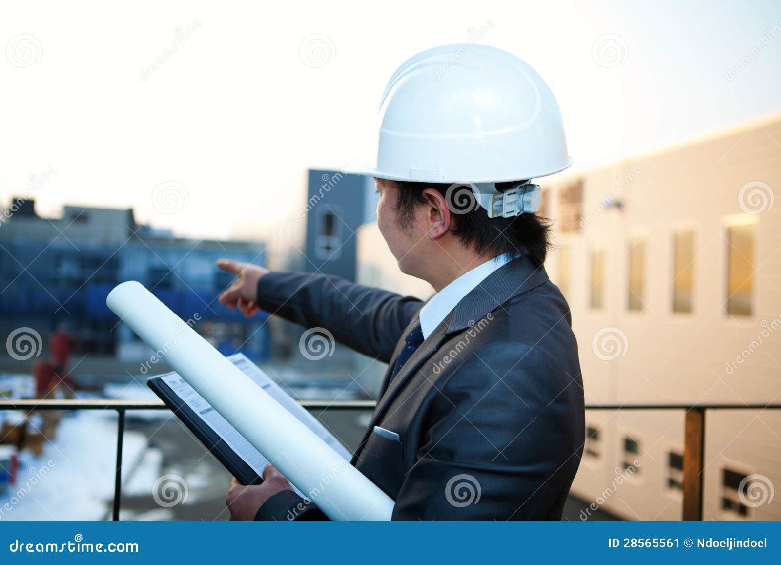 Young Architect Pointing at the Building Construction Stock Image ...