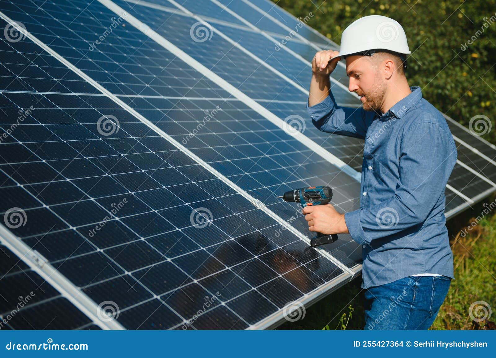 Young Architect Standing by Solar Panels Stock Photo - Image of helmet ...