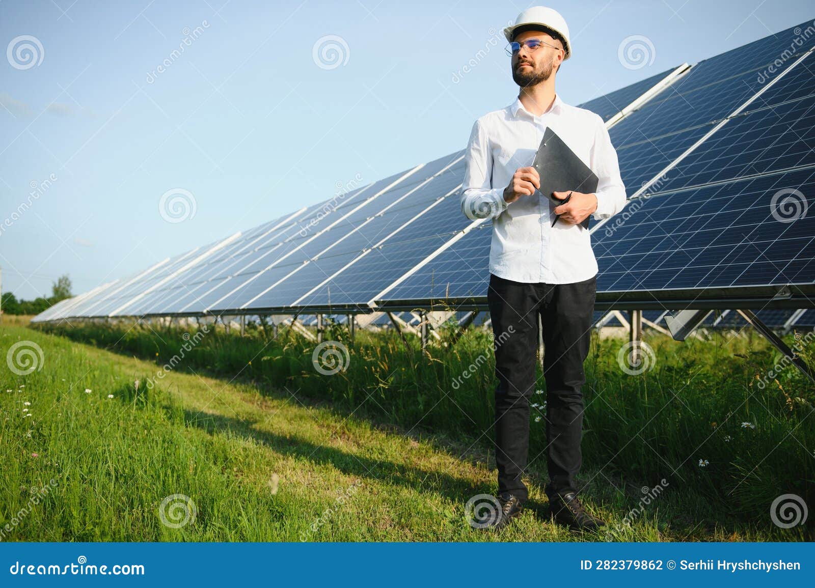 Young Architect Standing by Solar Panels Stock Photo - Image of worker ...