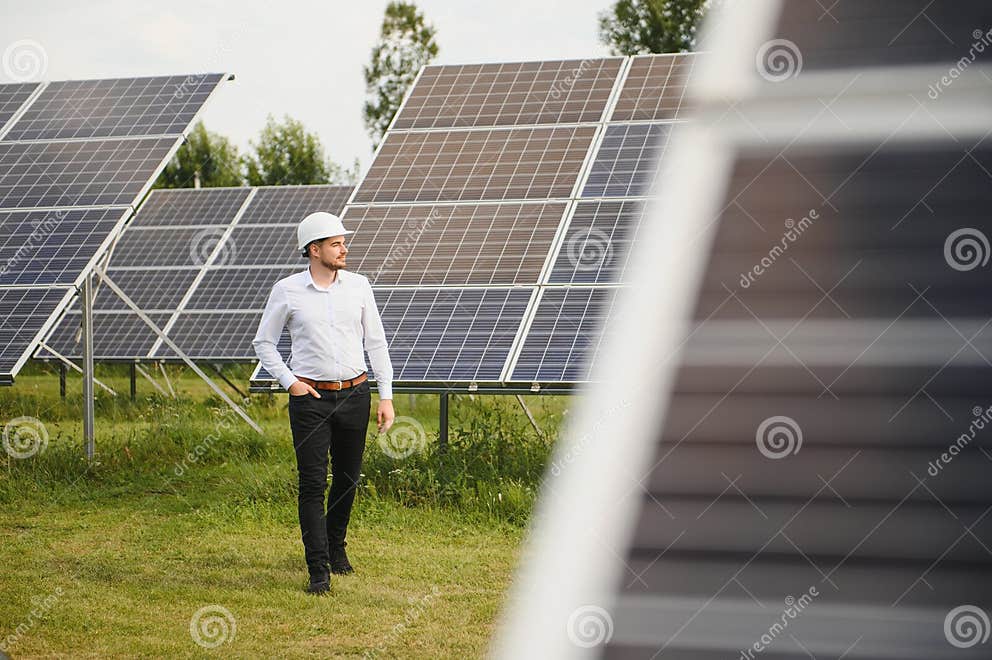 Young Architect Standing by Solar Panels Stock Photo - Image of ...
