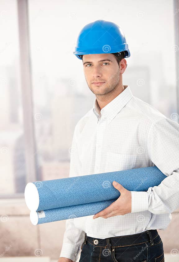 Young Architect Wearing Hardhat Stock Image - Image of color, male ...