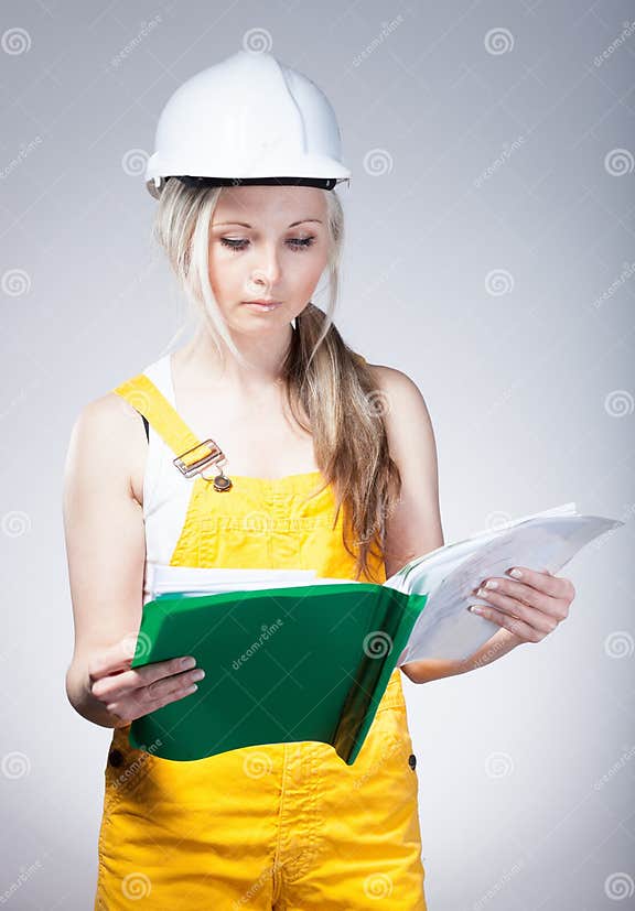 Young Architect Woman Construction Worker Reading Blueprints Stock ...