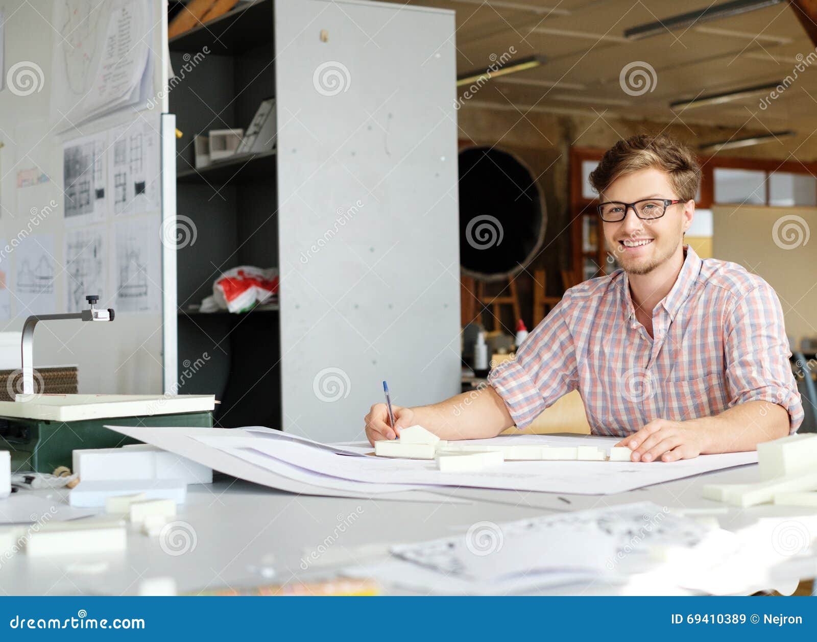 Young Architect Working on Drawing Table in Architect Studio. Stock ...