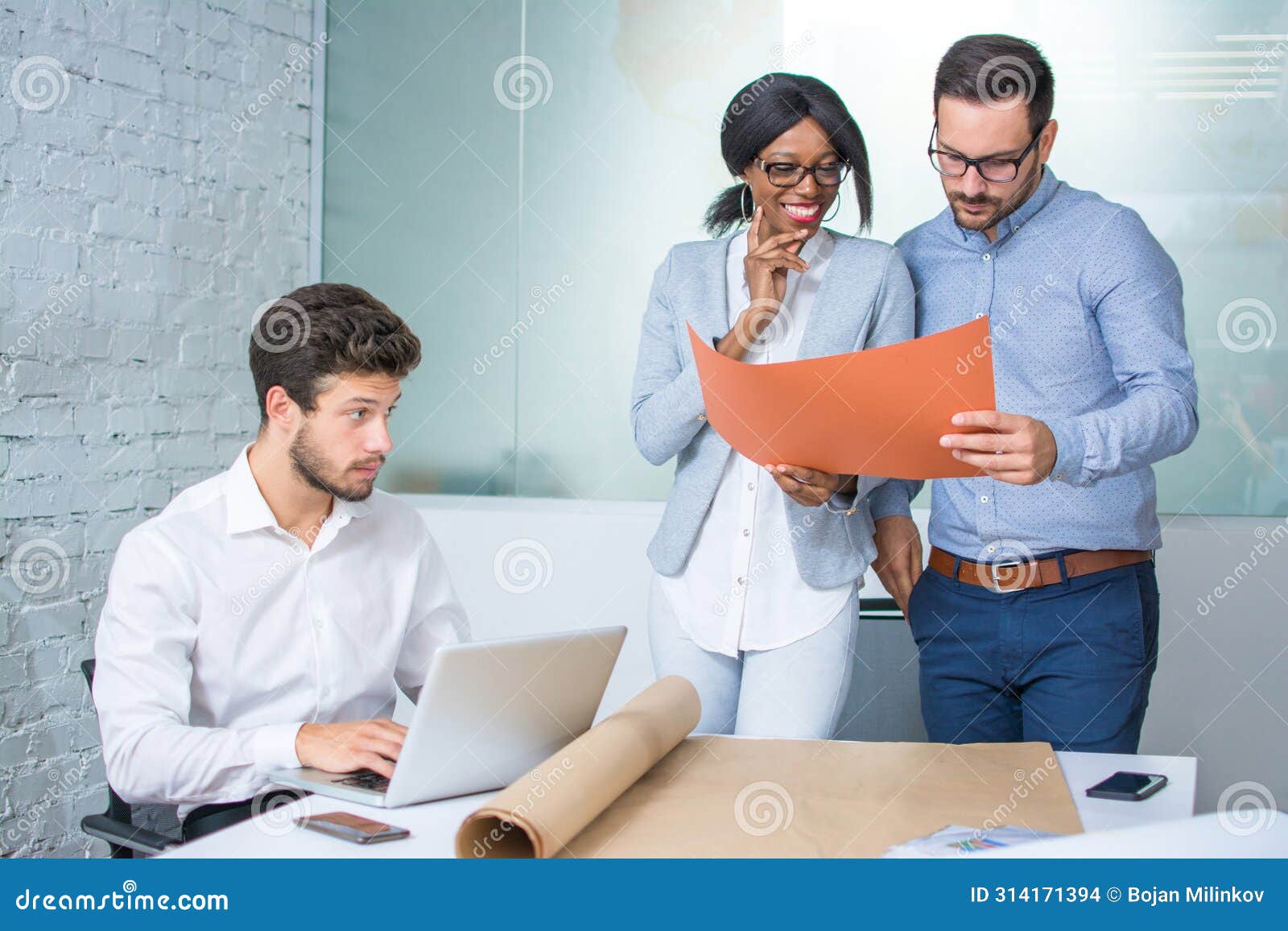 Young Architects Working Together on a Building Project in Office Stock ...
