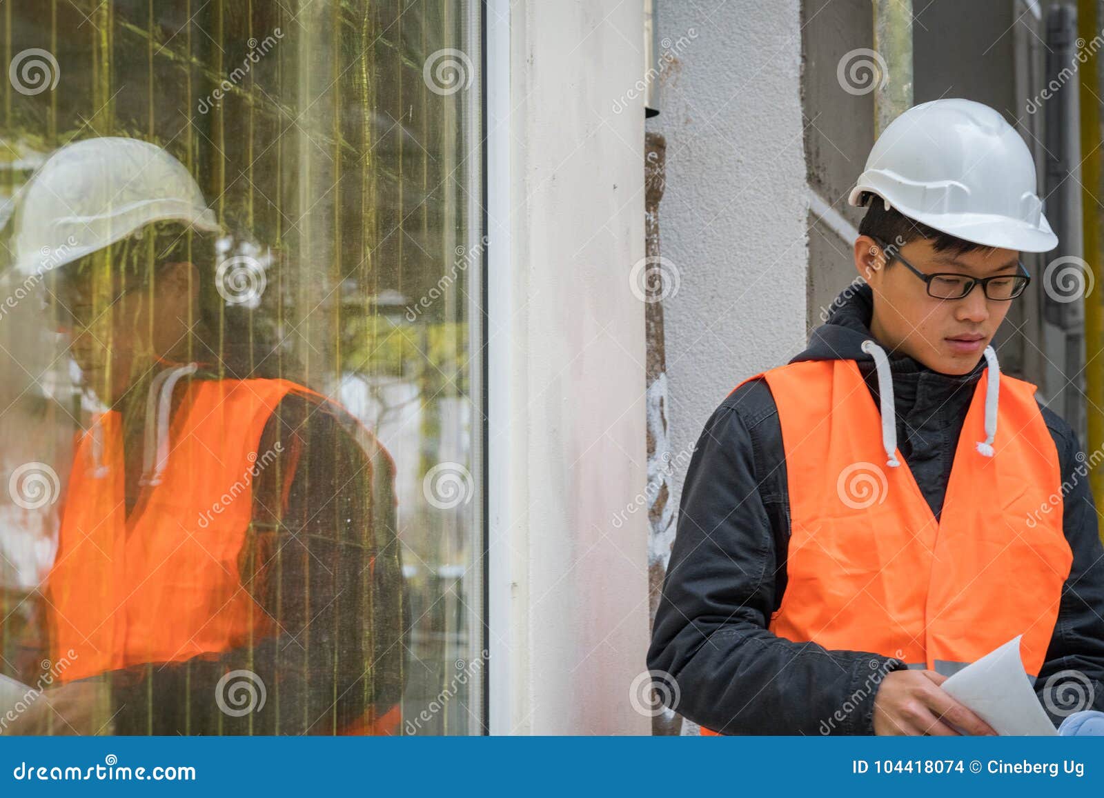 Young Asian Engineer at Work on Construction Site Stock Photo - Image ...