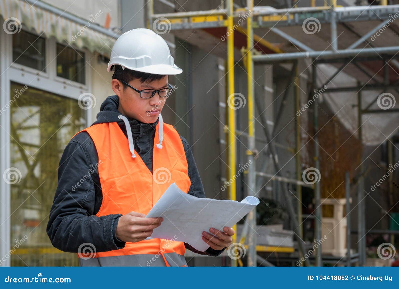 Young Asian Engineer at Work on Construction Site Stock Photo - Image ...