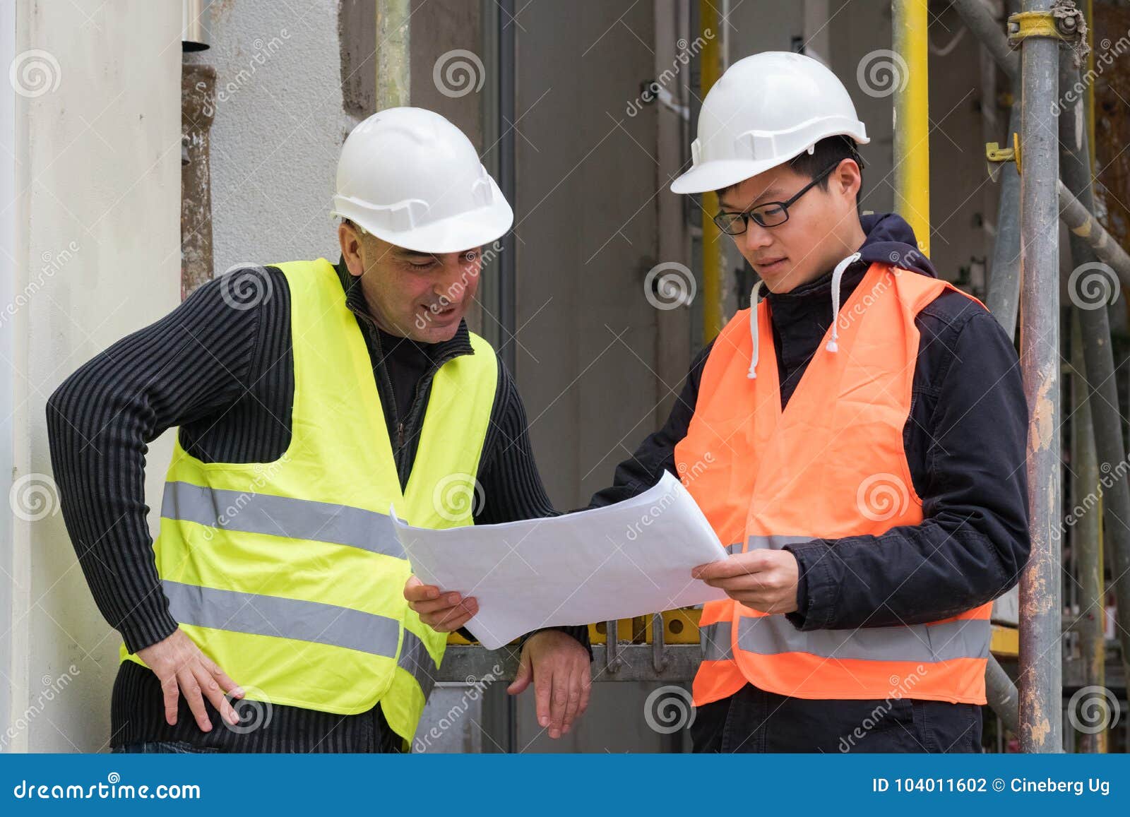 Young Asian Apprentice at Work with Senior Engineer Stock Photo - Image ...