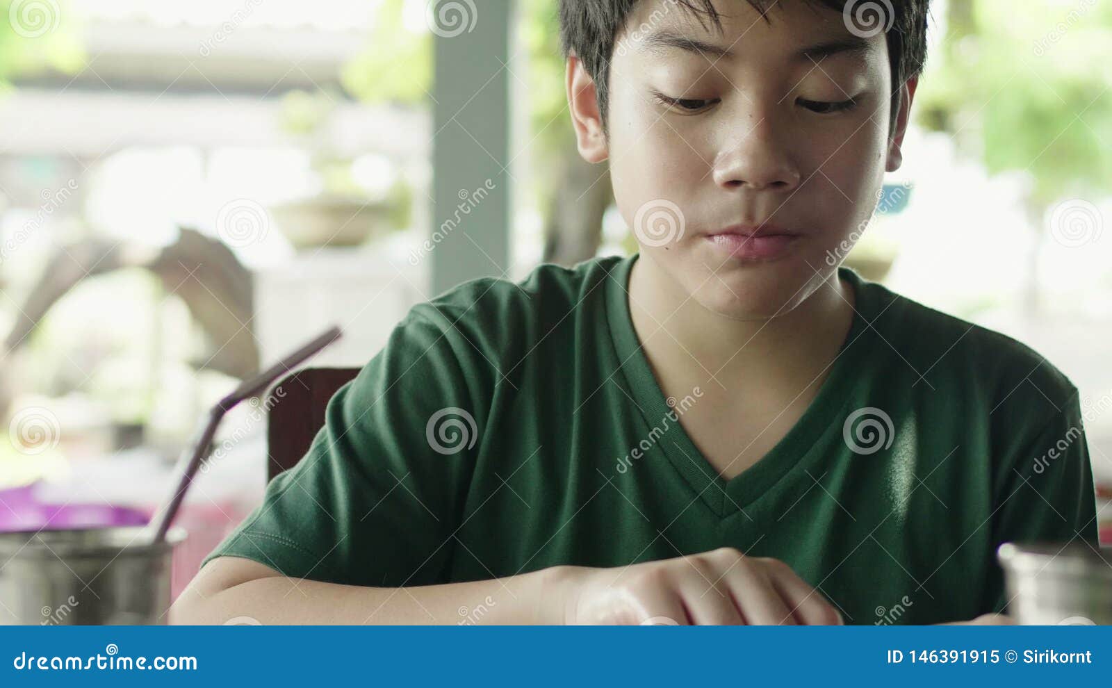 Young Asian Boy Eating Fried Rice with Meat for Breakfast. Stock Video ...