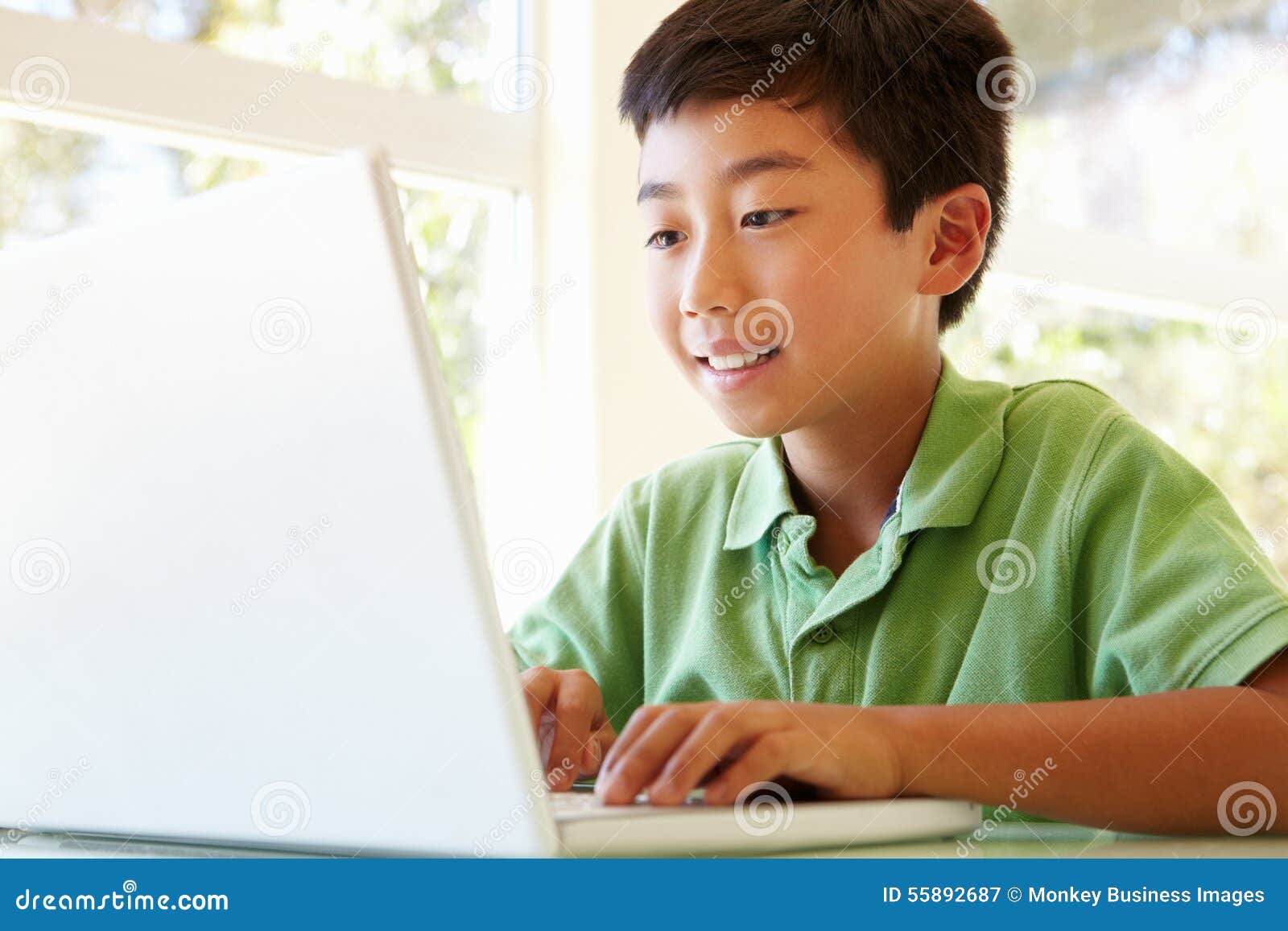 Young Asian Boy Using Laptop Stock Image - Image of desk, game: 55892687