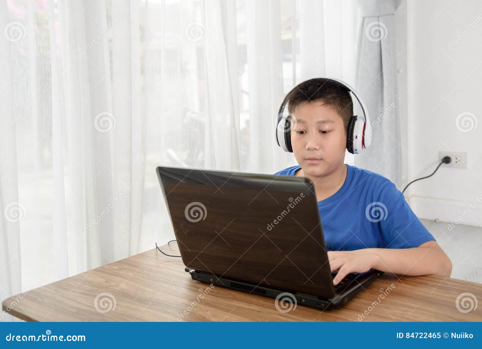 Young Asian Boy Using Laptop Technology Stock Image - Image of family ...