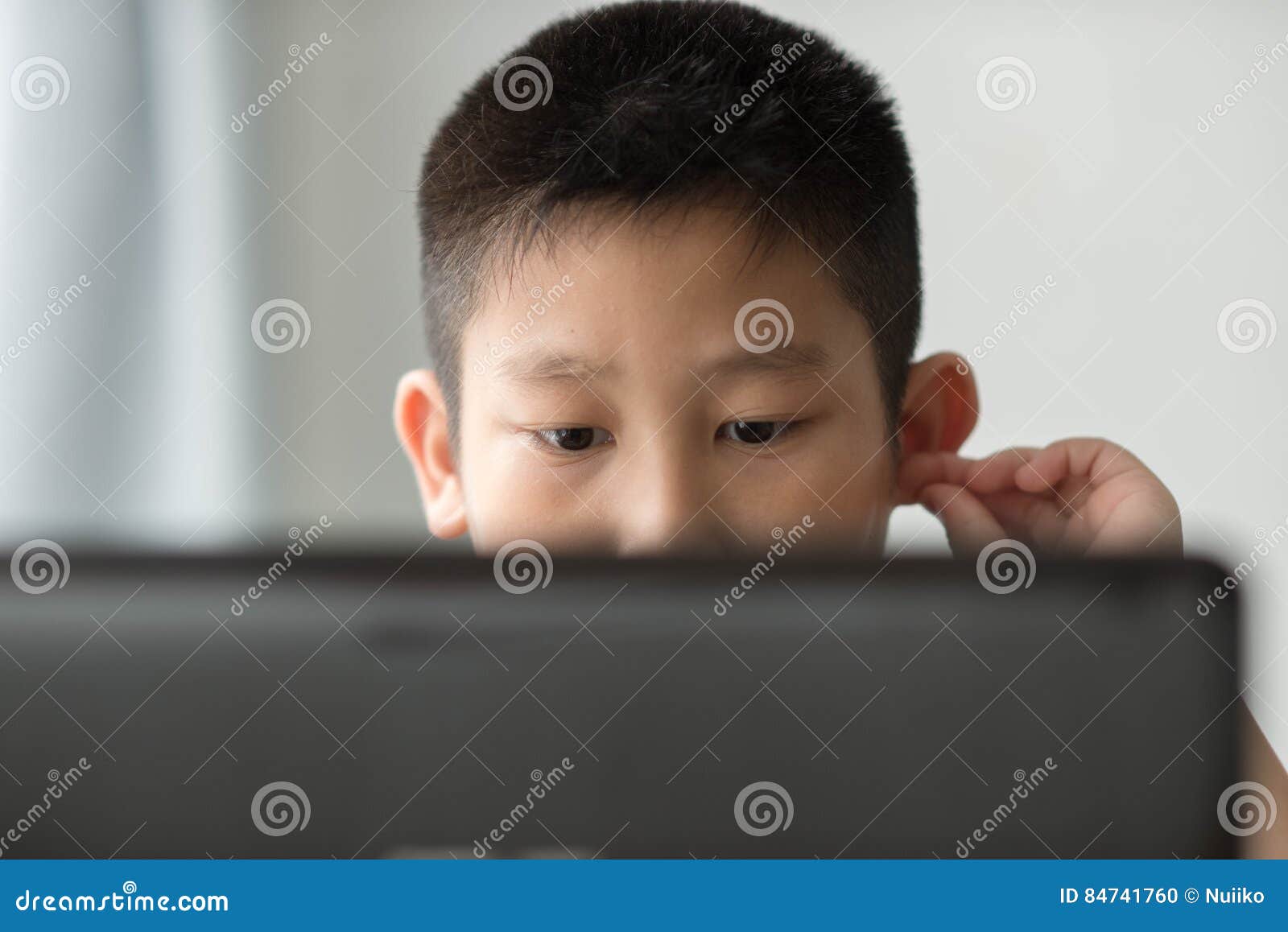 Young Asian Boy Using Laptop Technology at Home. Stock Photo - Image of ...