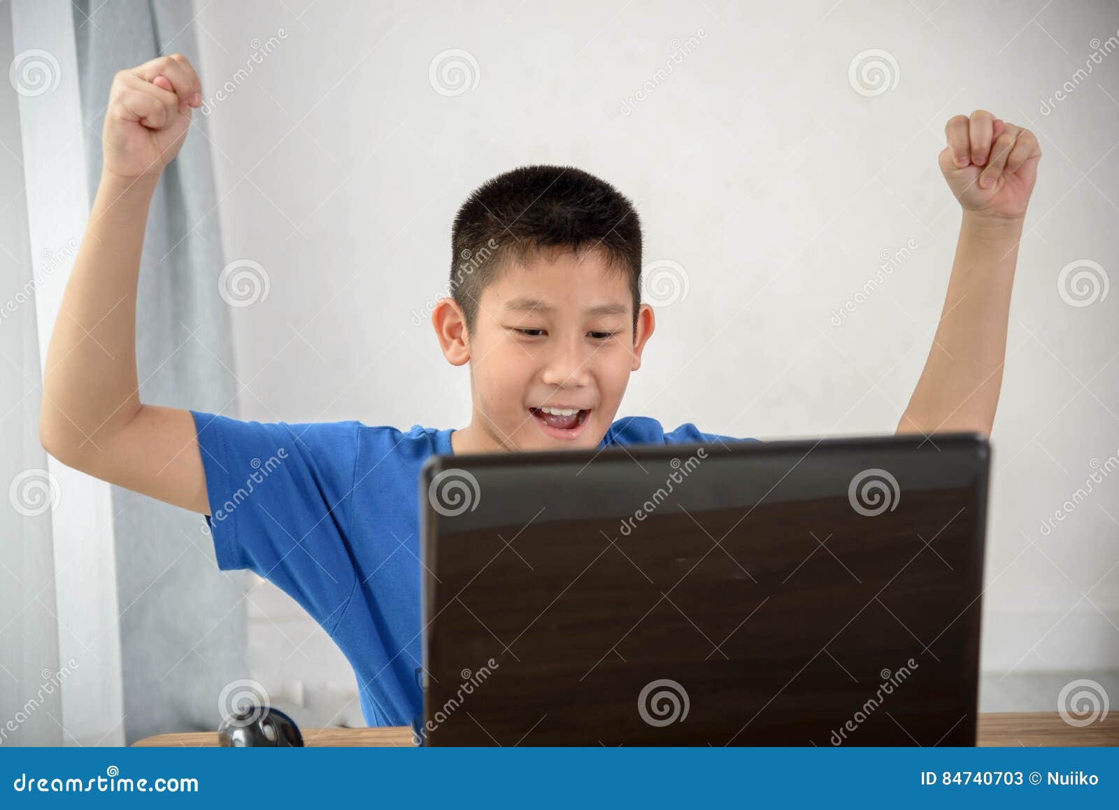 Young Asian Boy Using Laptop Technology at Home. Stock Image - Image of ...