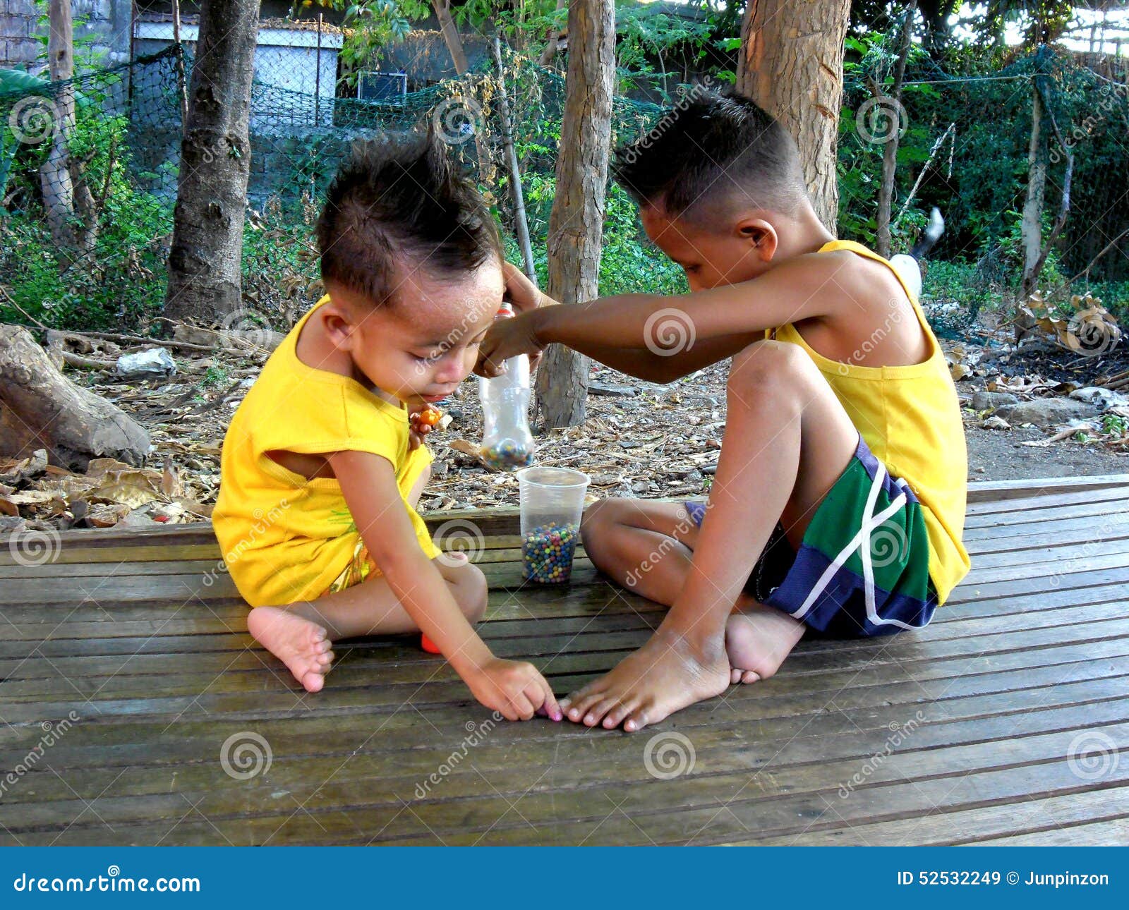 Young Asian Boys Playing Under a Tree Editorial Stock Image - Image of ...