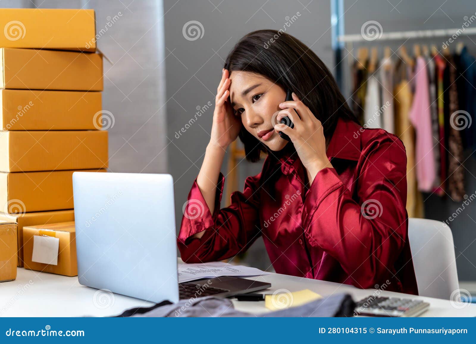 Young Asian Business Female Entrepreneur Having a Phone Call Problem ...