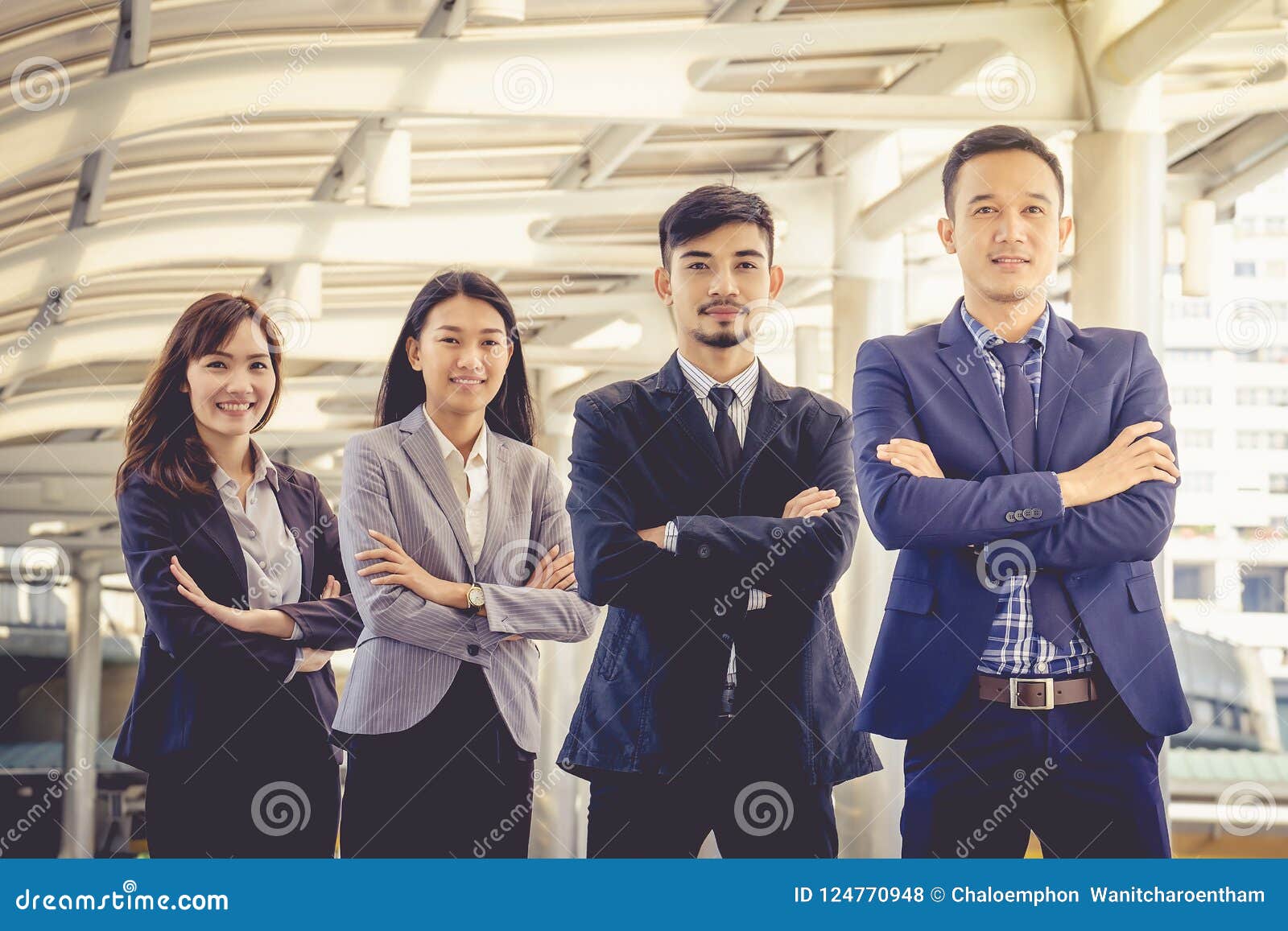 The Young Asian Business Team Stands with Confidence and Pride. Stock ...