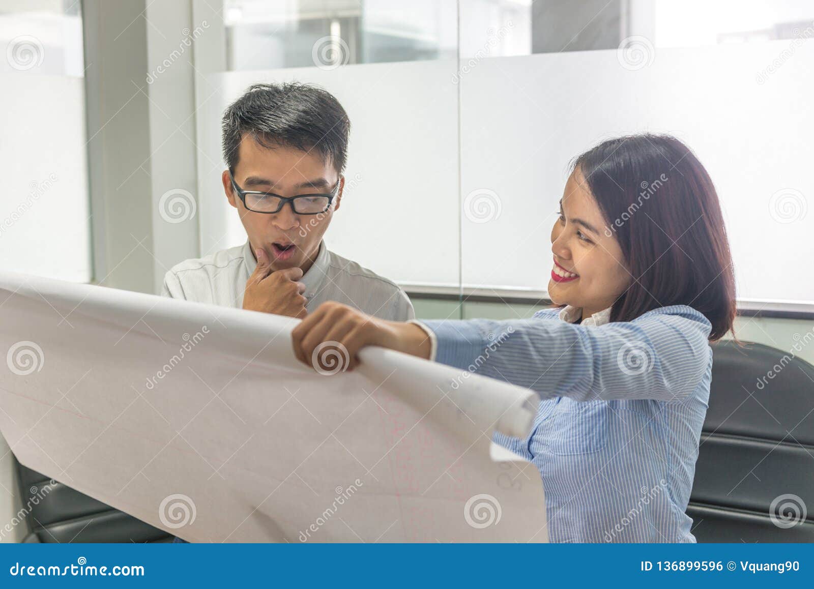 Young Asian Business Team Working and Discussing about New Project ... Young Asian Business Team Working and Discussing about New Project ...