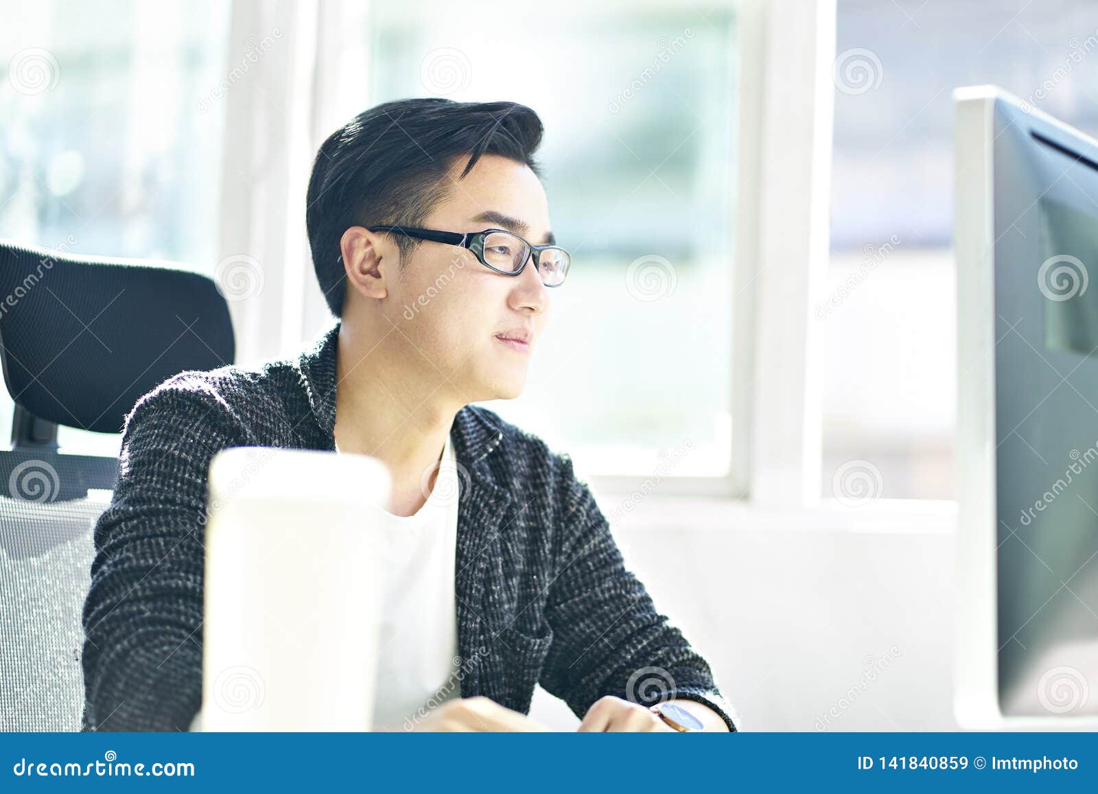 Young Asian Businessman Working in Office Stock Image - Image of ...