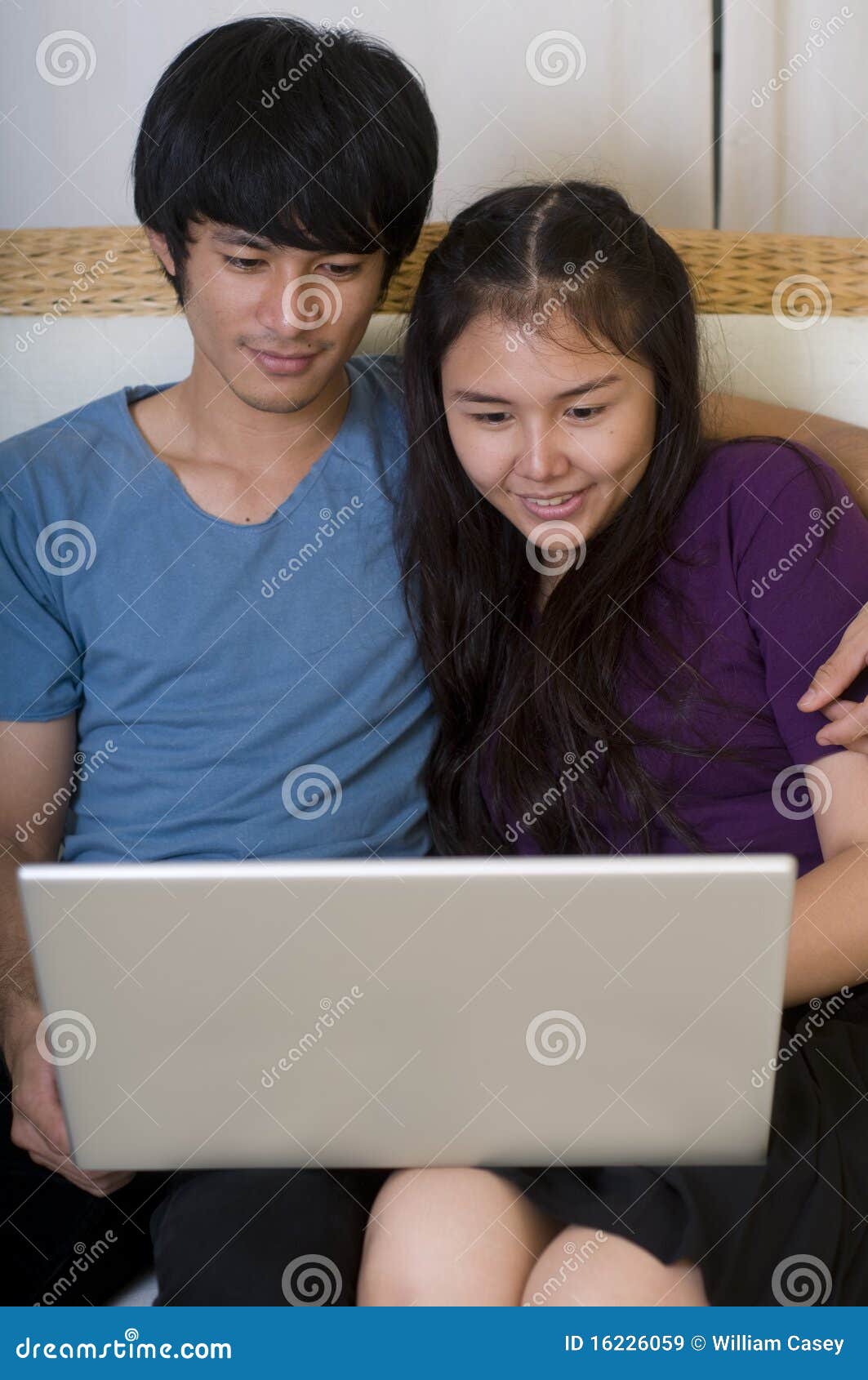 Young Asian Couple with Computer Stock Image - Image of together ...