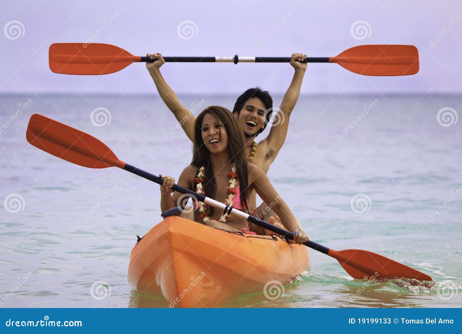 Young Asian Couple in Their Kayak Stock Image - Image of girl, clouds ...